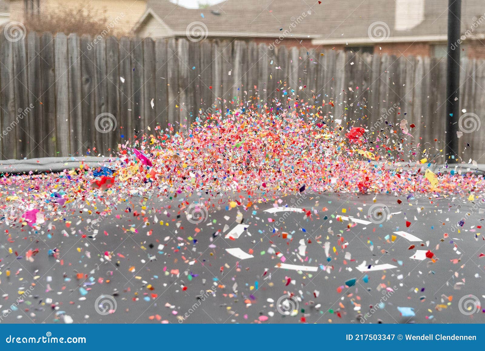 Colorful Confetti Flying in the Air Over Trampoline Stock Image - Image ...