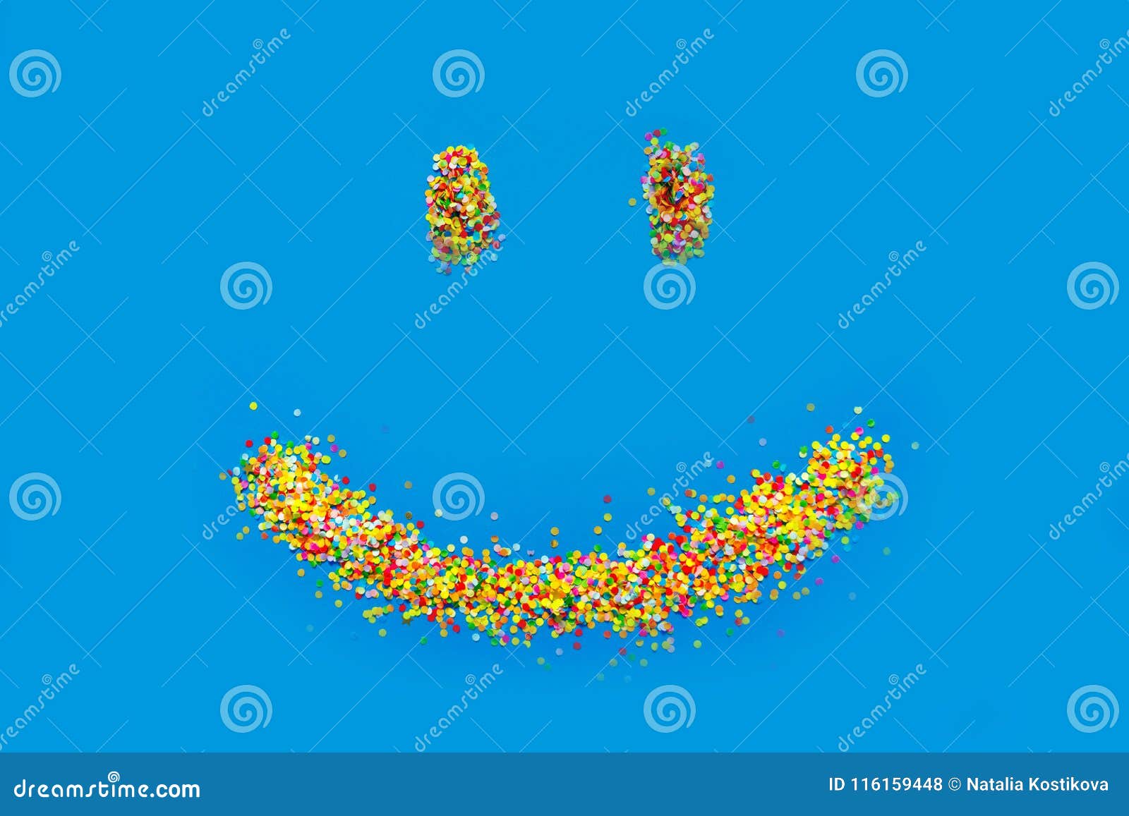 Smiling face of confetti. stock photo. Image of blue - 116159448