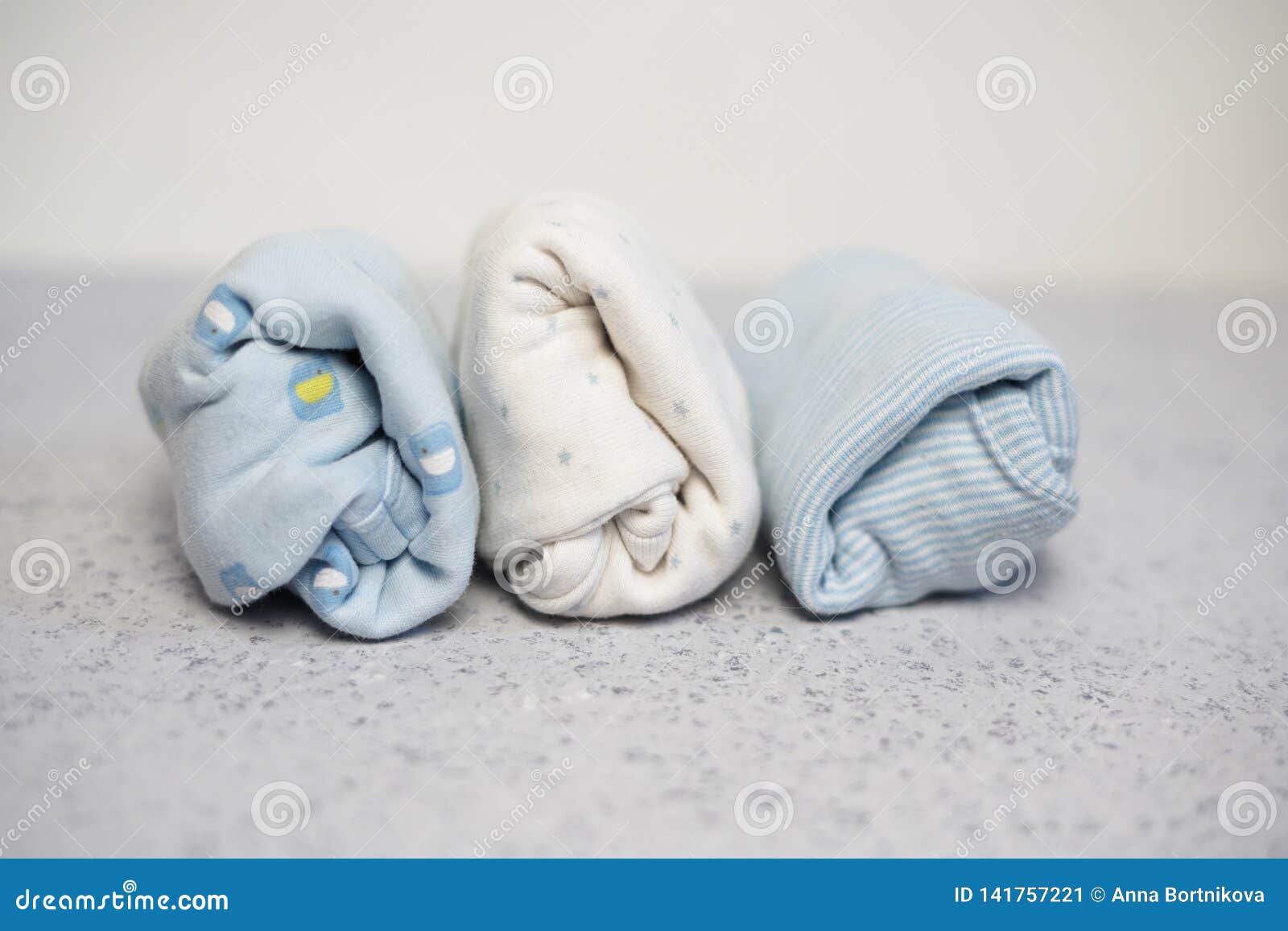 Colorful Cotton Folded Clothes Stack on White Table Empty Space ...