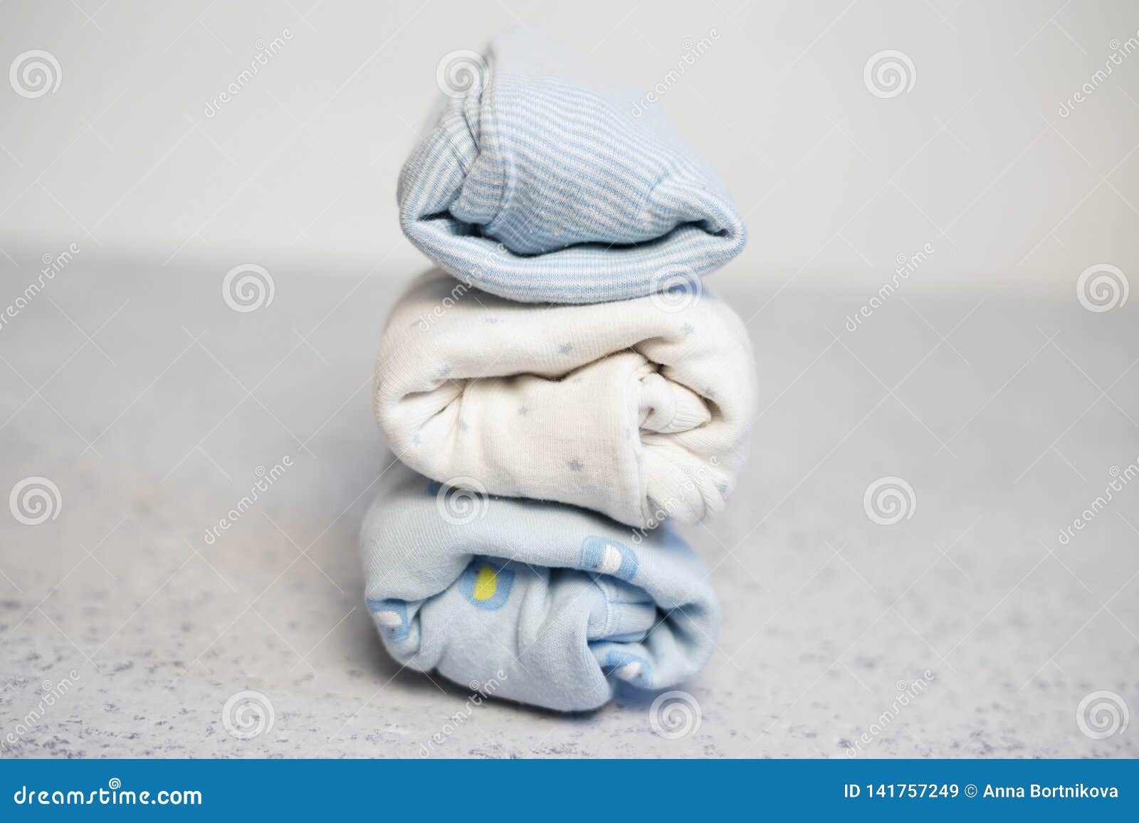 Colorful Cotton Folded Clothes Stack on White Table Empty Space ...