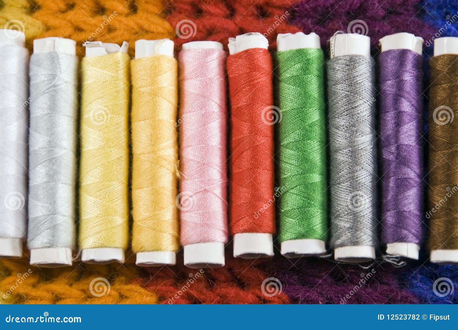 Colorful Cotton Reels in a Row Stock Photo - Image of group, green ...