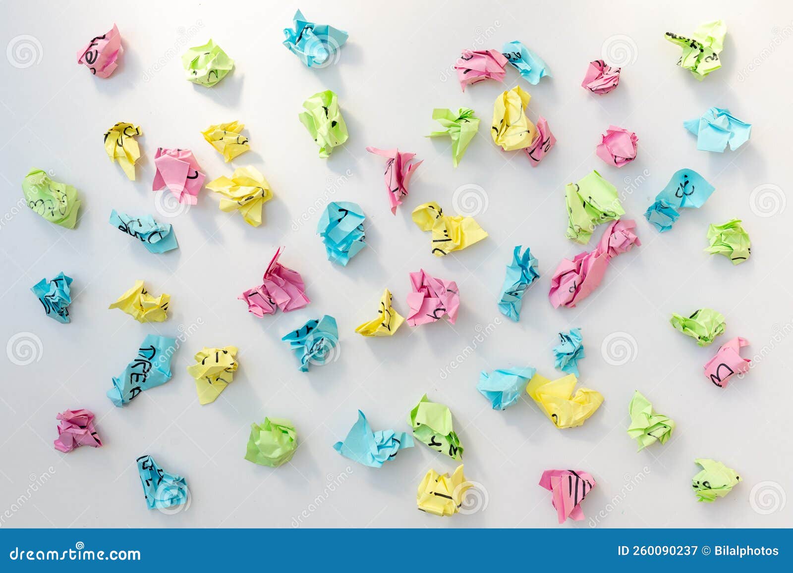 Colorful Crumbled Paper Sticky Notes on a White Isolated Background ...