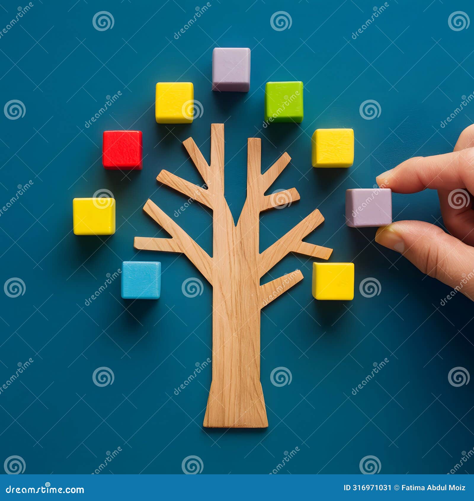 Colorful Cube Tree Structure with Hand Holding a Cube, Symbolizing ...