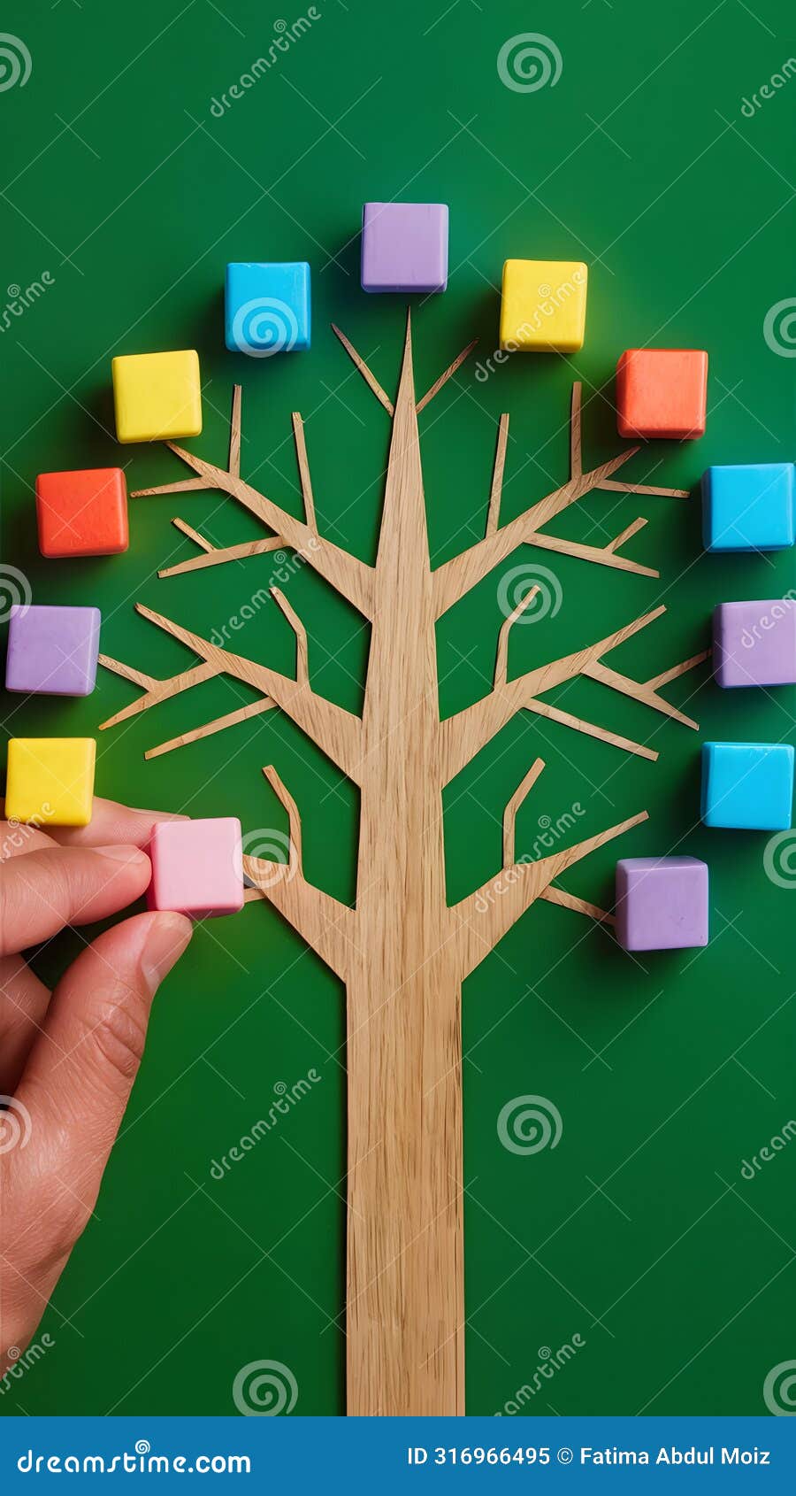 Colorful Cube Tree Structure with Hand Holding a Cube, Symbolizing ...