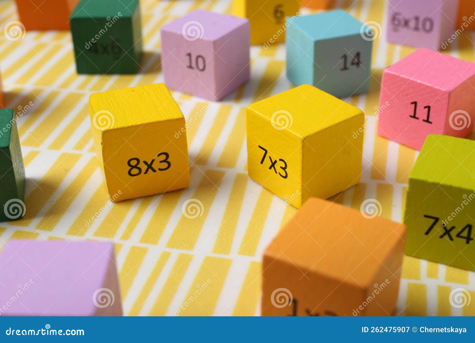 Colorful Cubes with Numbers and Multiplications on Yellow Background ...