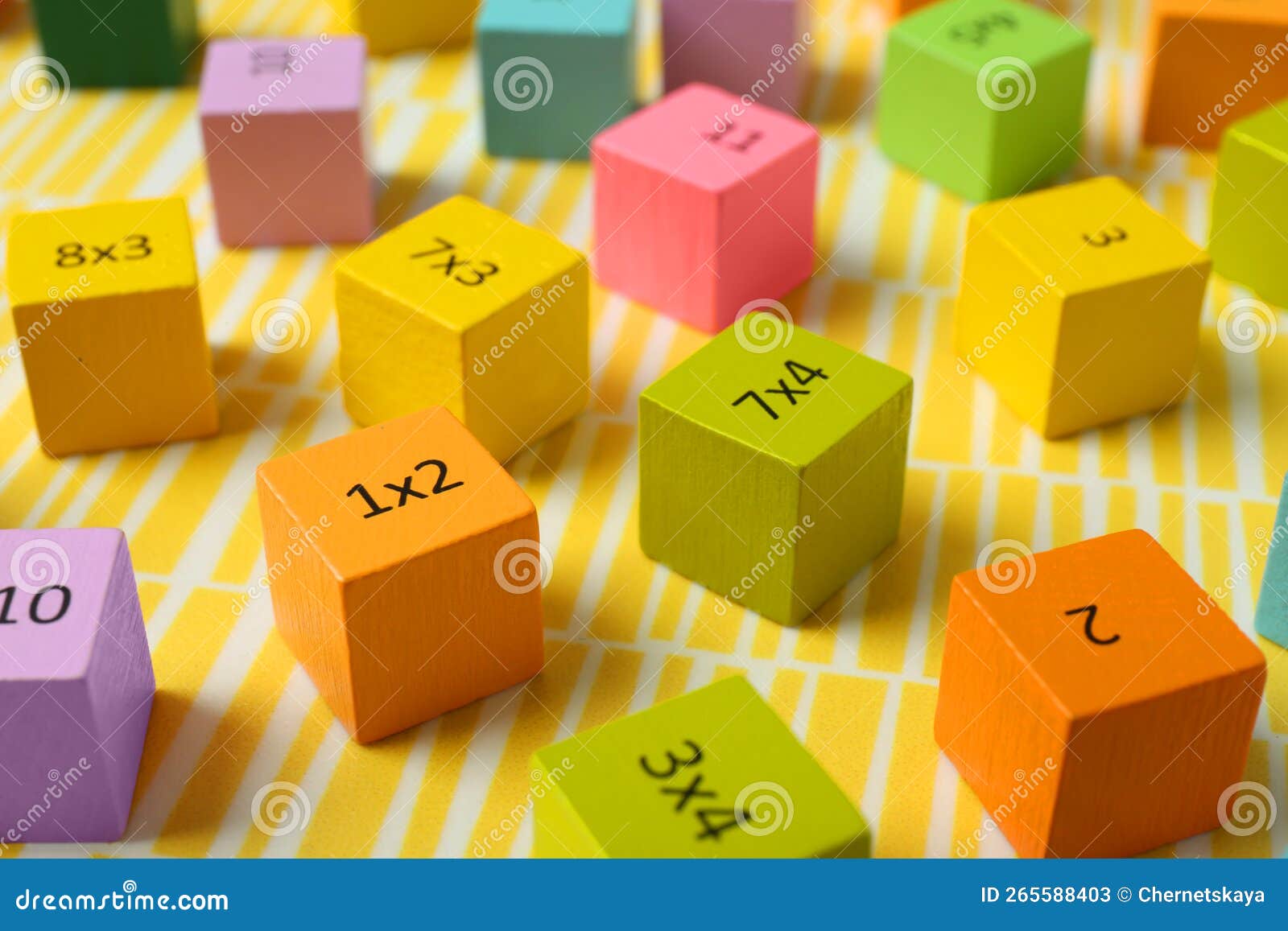 Colorful Cubes with Numbers and Multiplications on Yellow Background ...