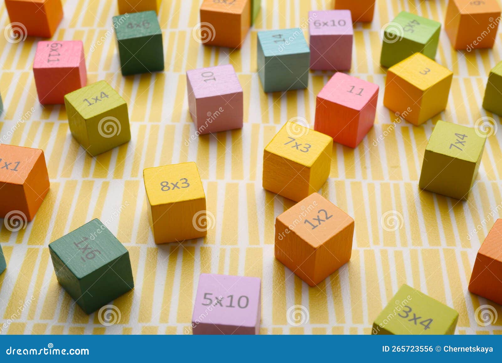 Colorful Cubes with Numbers and Multiplications on Yellow Background ...