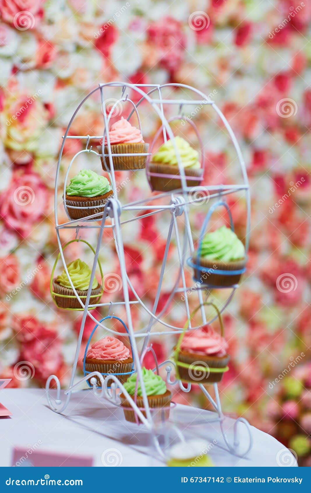 Colorful Cupcakes on a Small Ferris Wheel Stock Photo - Image of ...