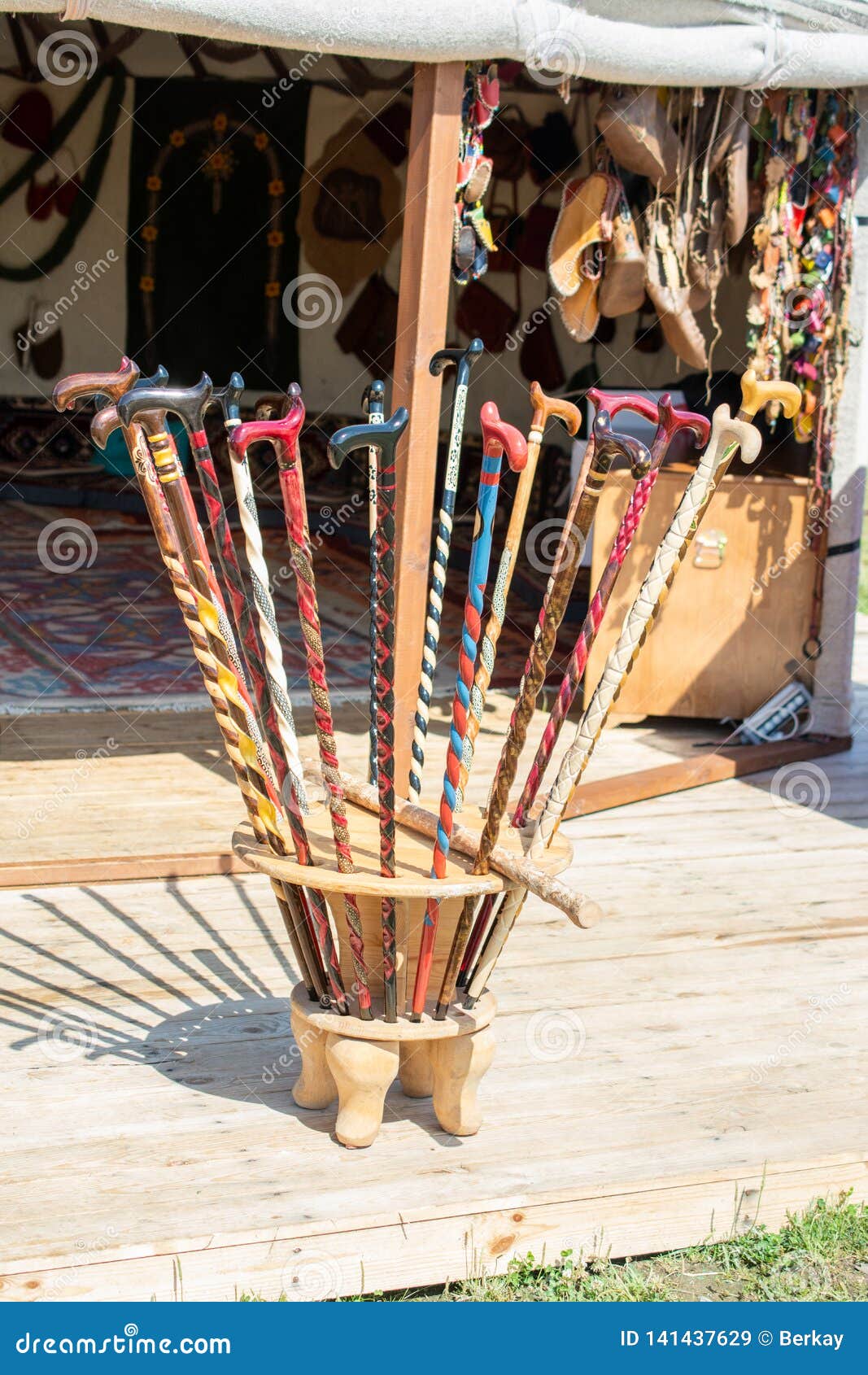 Colorful Decorative Wooden Walking Sticks on Display Stock Image ...