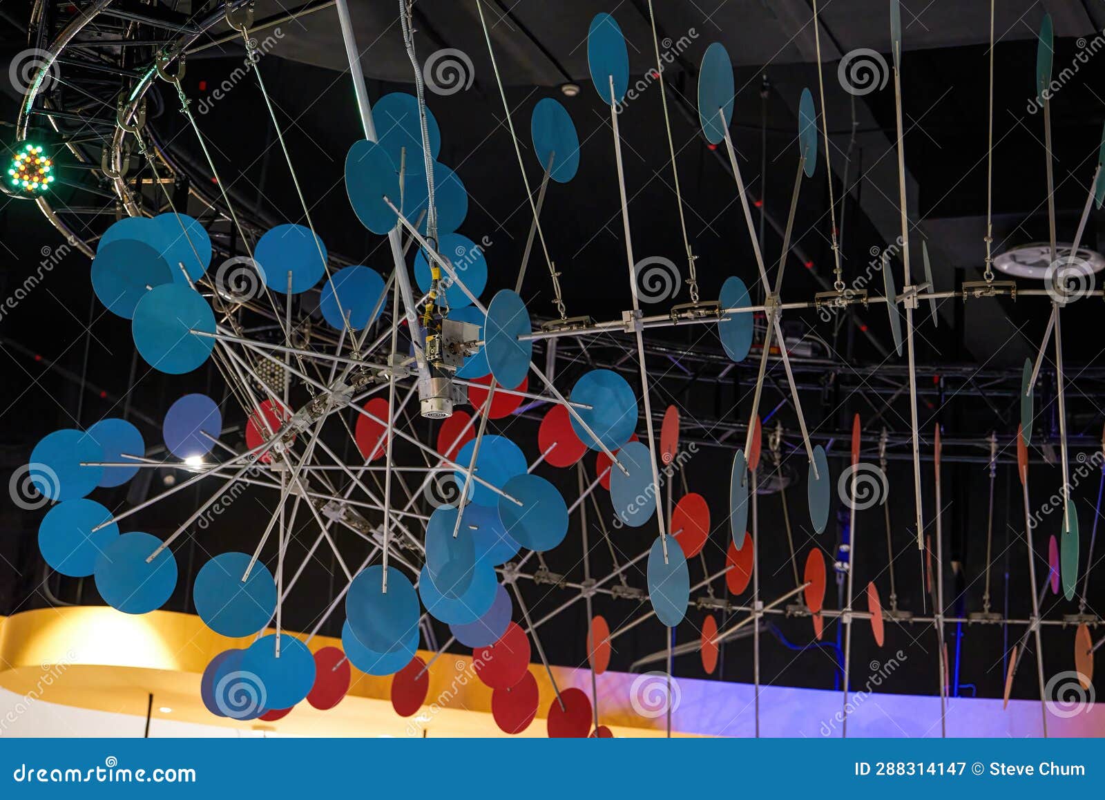 Colorful Disc Sculpture Hanging Indoors Stock Image - Image of glass ...