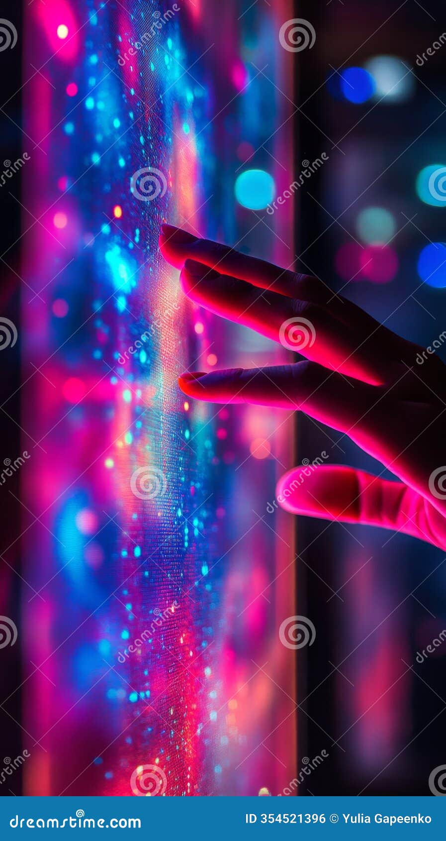 Colorful Display of Light Effects As a Hand Interacts with Glowing ...
