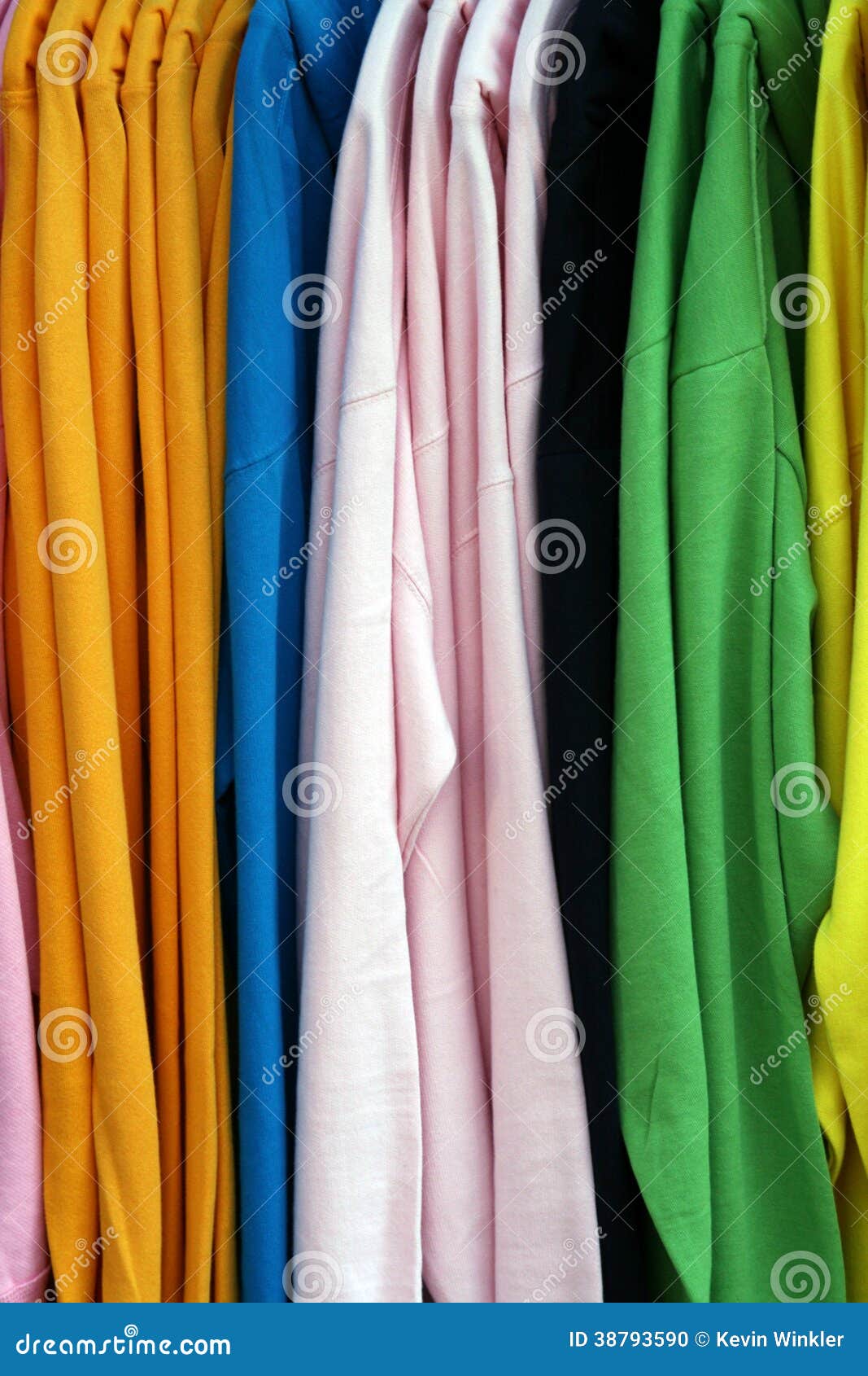 Colorful Display on Shirts Hanging on a Rack Stock Photo - Image of ...