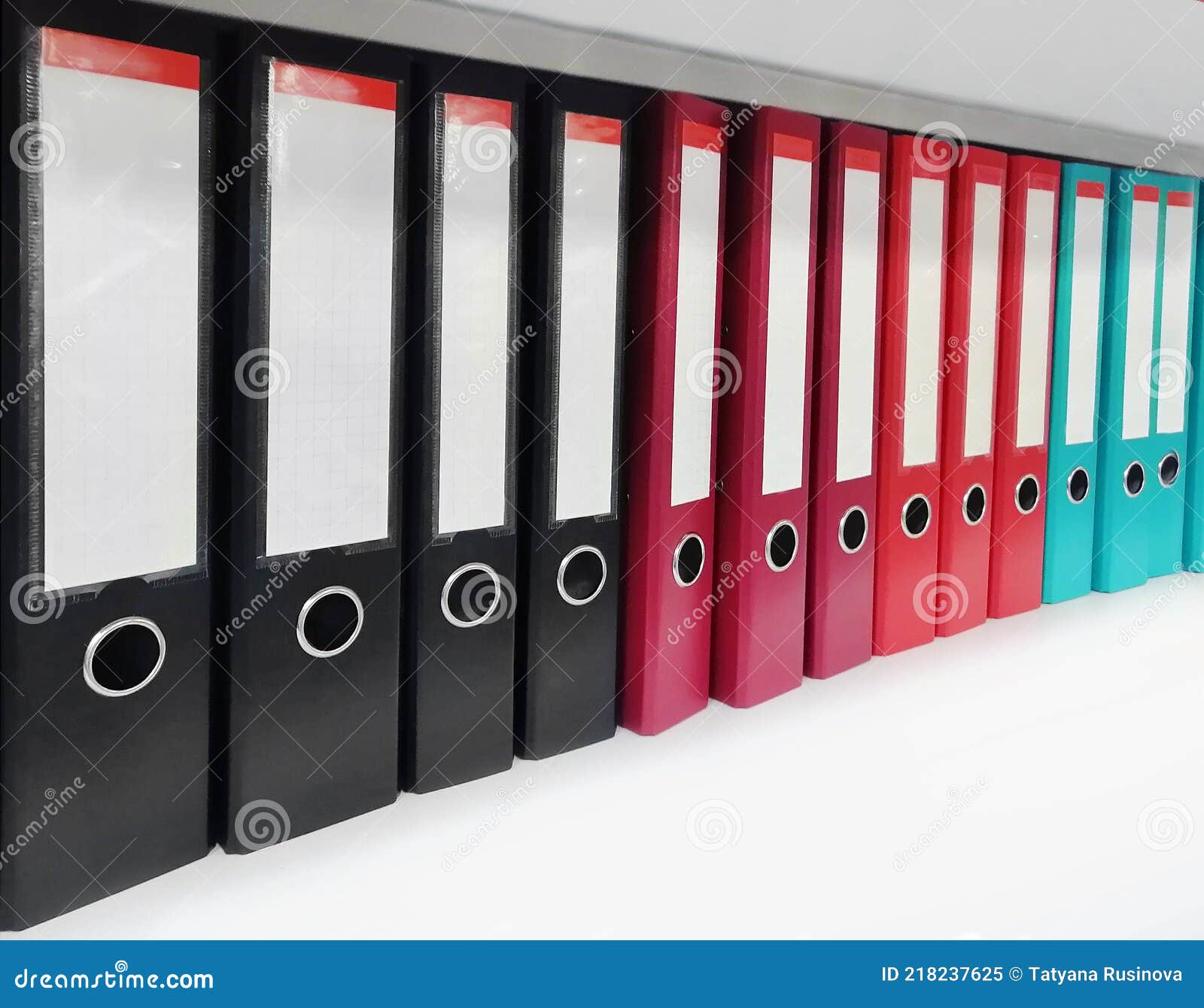 Colorful Document Folders on a White Bookshelf Stock Image - Image of ...