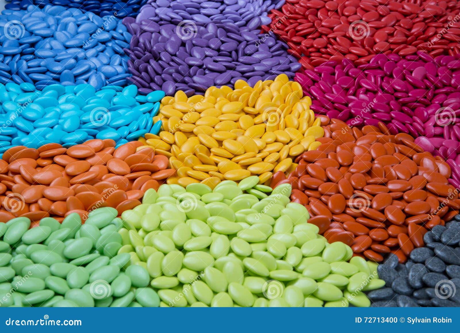 Color Dragees On Dark Blue Color Background. Royalty-Free Stock ...