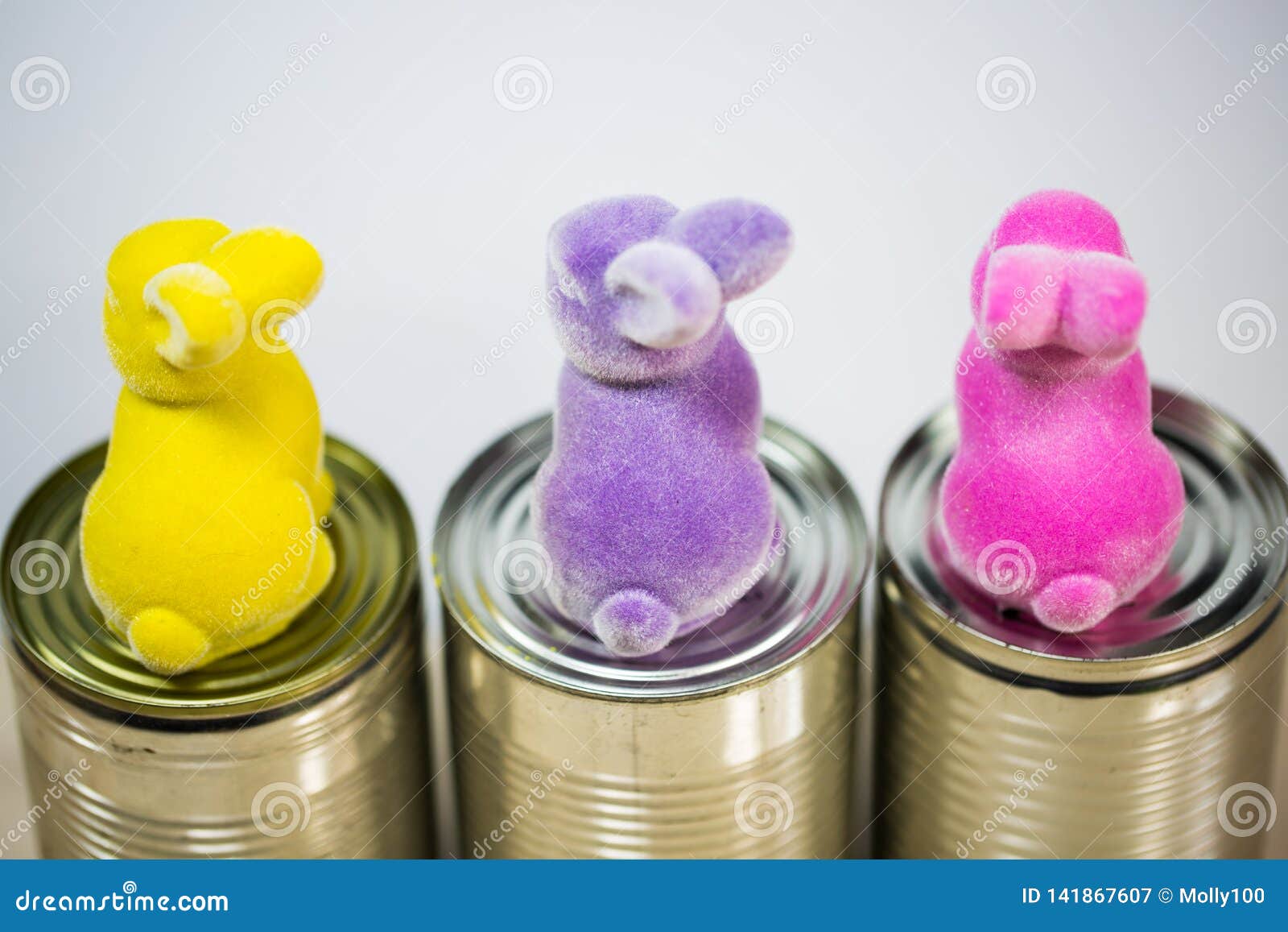 Colorful Easter Bunnies on Tin Cans Stock Image - Image of copy ...
