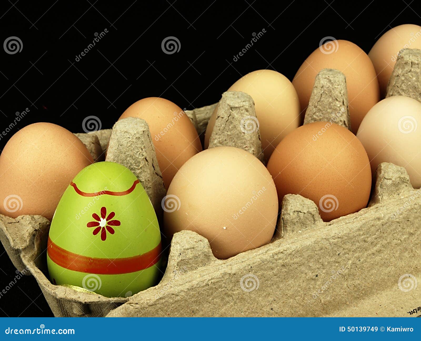 Colorful Easter Egg in the Company of Ordinary Eggs. Stock Image ...