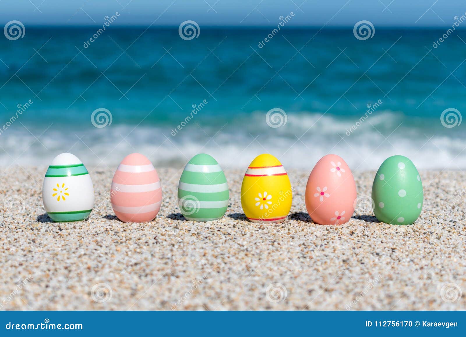 Colorful Easter Eggs on the Beach in Sunny Day. Stock Photo - Image of ...