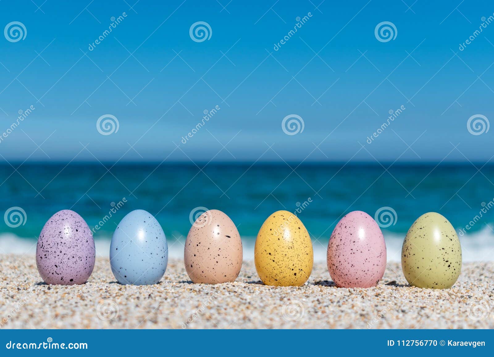 Colorful Easter Eggs on the Beach in Sunny Day. Stock Photo - Image of ...
