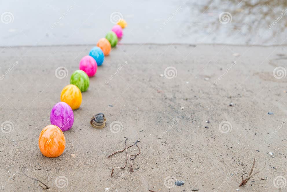 Colorful Easter Eggs on a River Bank Stock Image - Image of environment ...