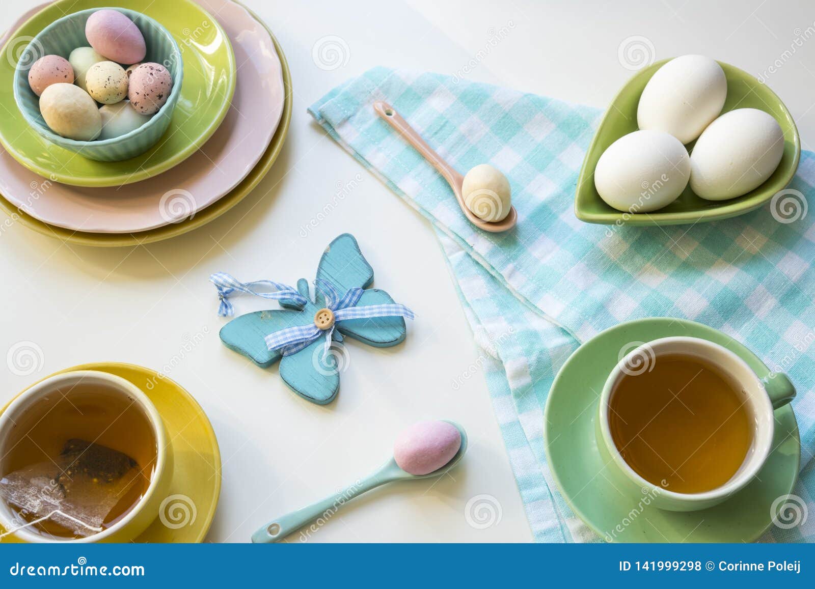 Colorful Easter Setting with Eggs and Thee Stock Photo - Image of green ...