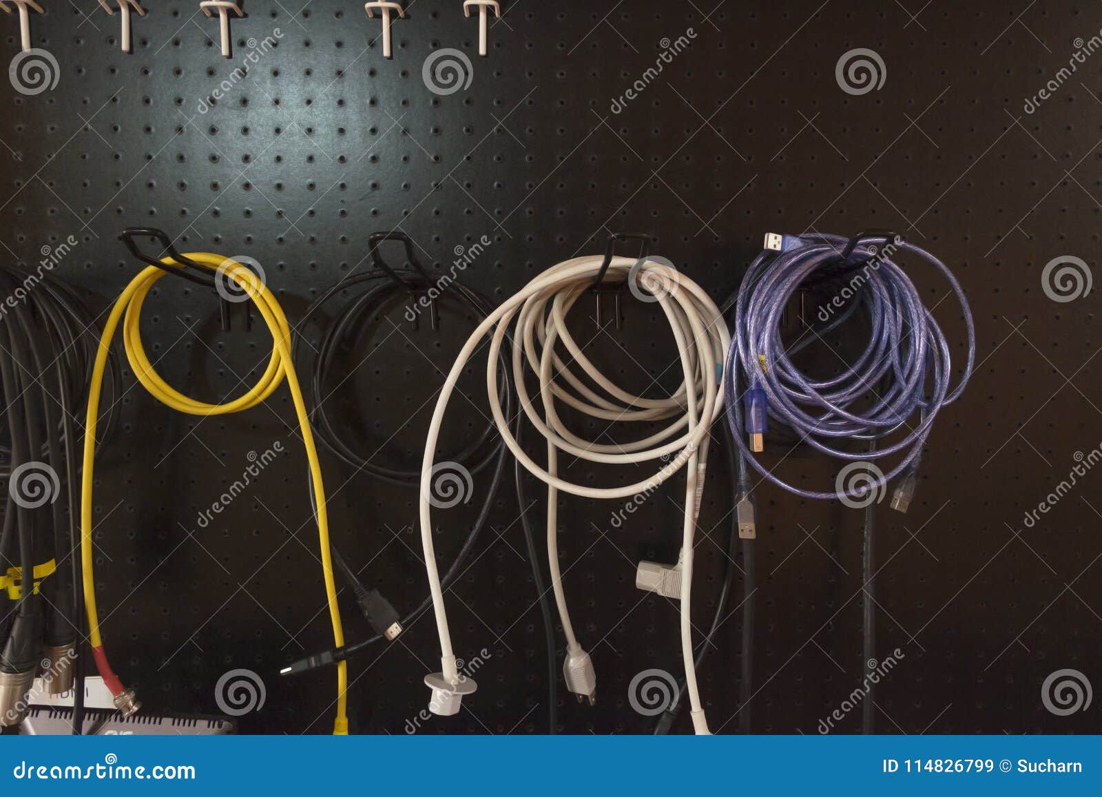 Colorful of Electric Wire Hanging on Storage Rack on Black Background ...