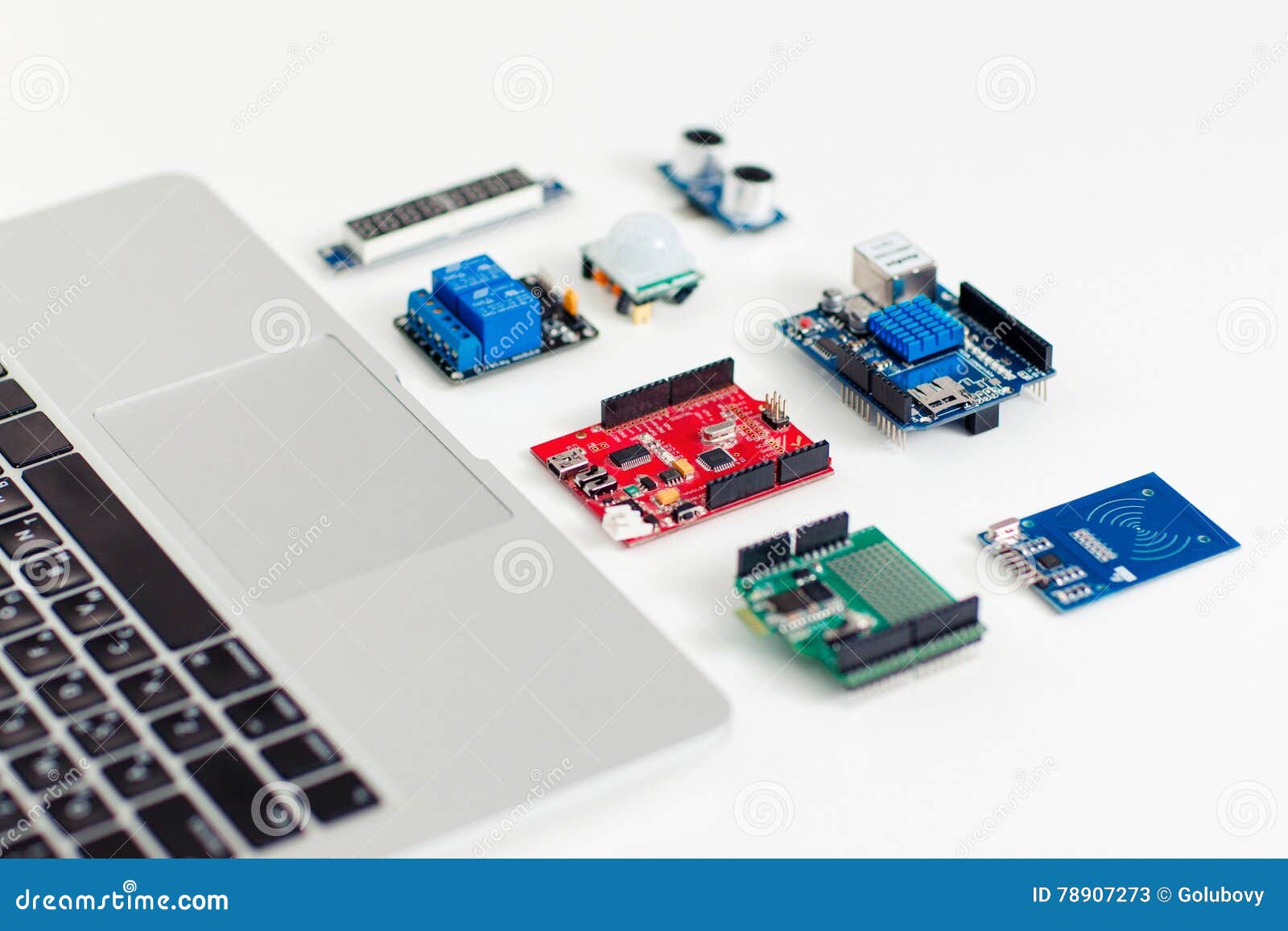 Colorful Electronic Components Near Laptop Stock Image - Image of ...