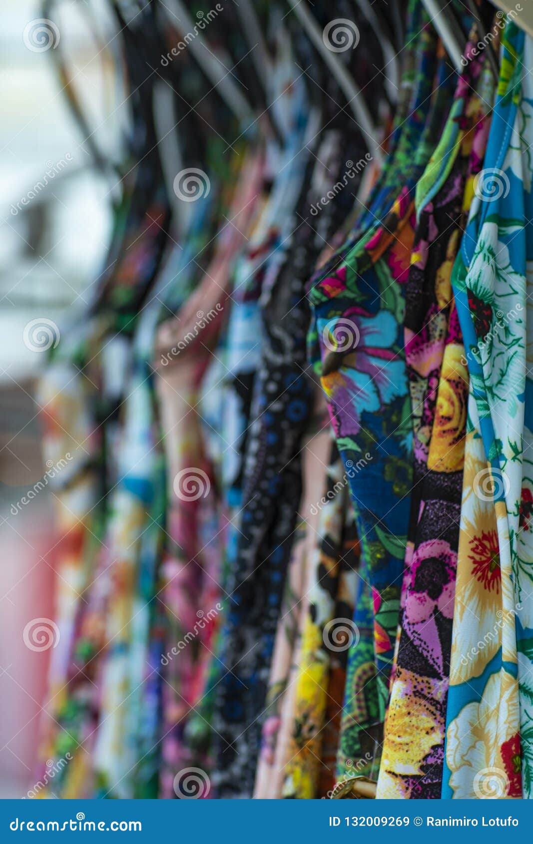 Colorful Fabrics Hanging and Lined. Fabrics with Different Patterns and ...