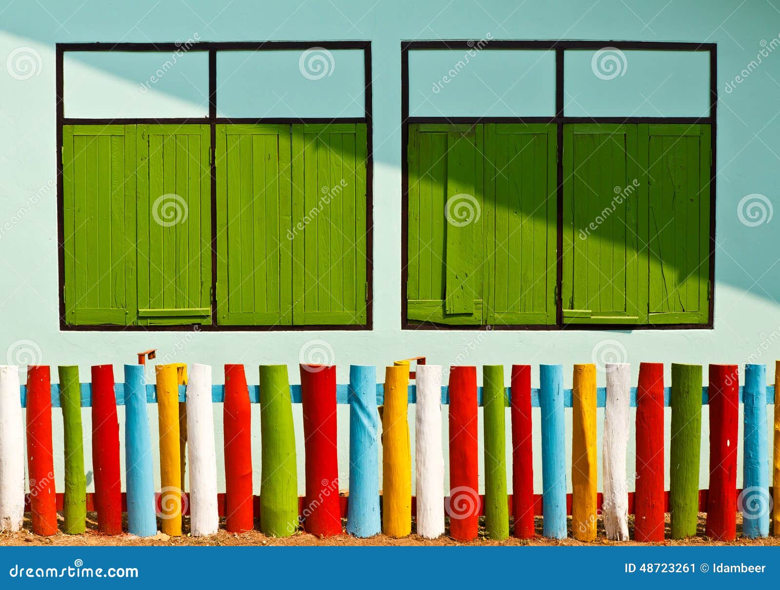 Colorful Fence and Green Window Stock Image - Image of board, ground ...