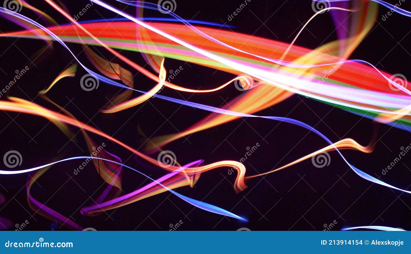 Colorful Fiber Strings in Motion Against Black Background Stock Photo ...