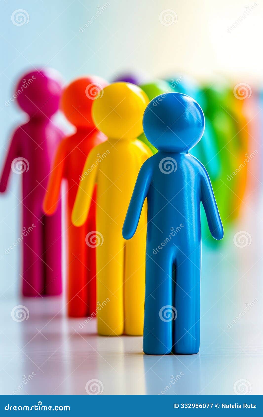 Colorful Figures Stand in a Row, Representing Diversity, Unity, and ...