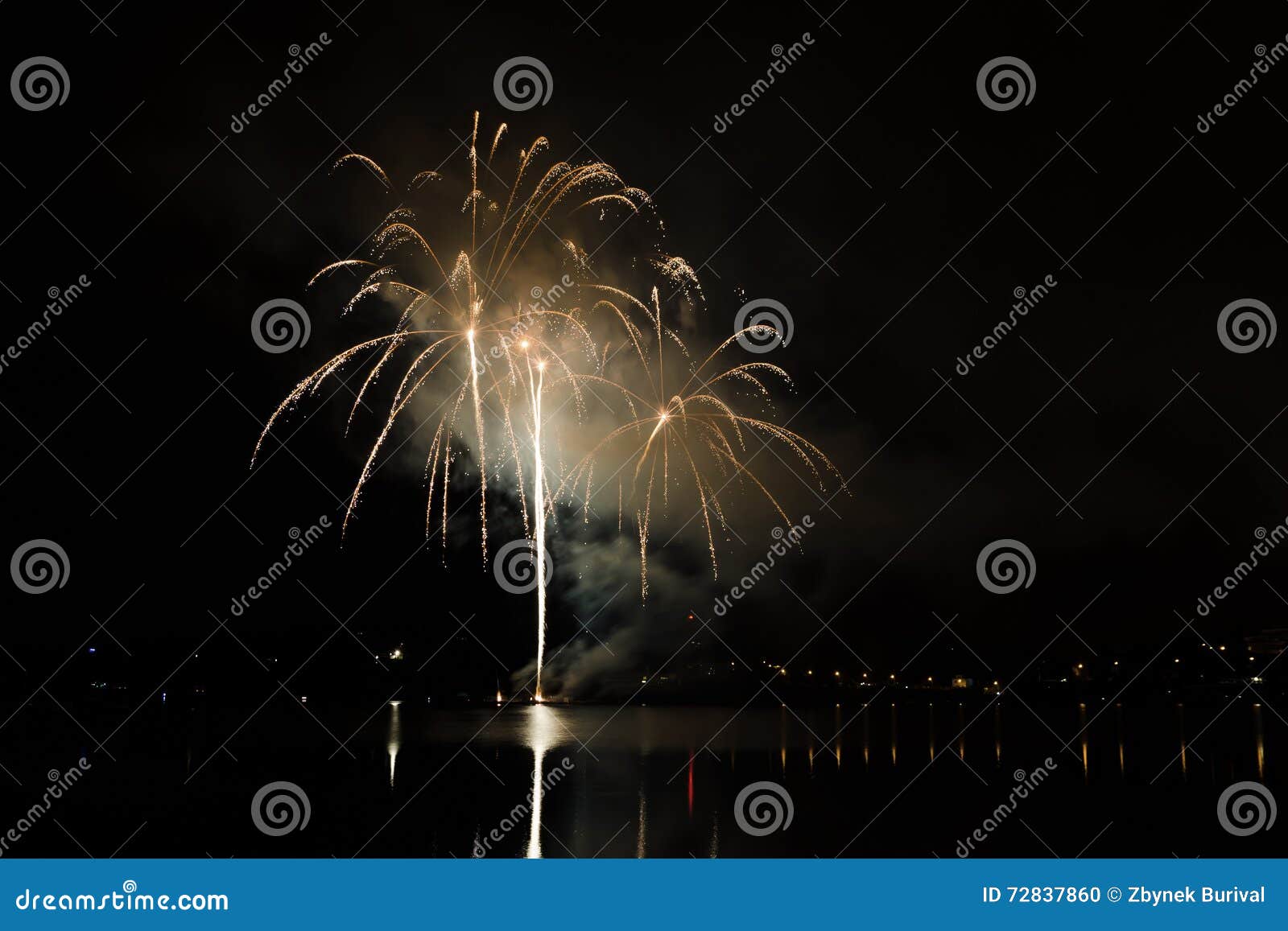 Colorful Fireworks Show with Rockets Bursting Above the Lake Stock ...