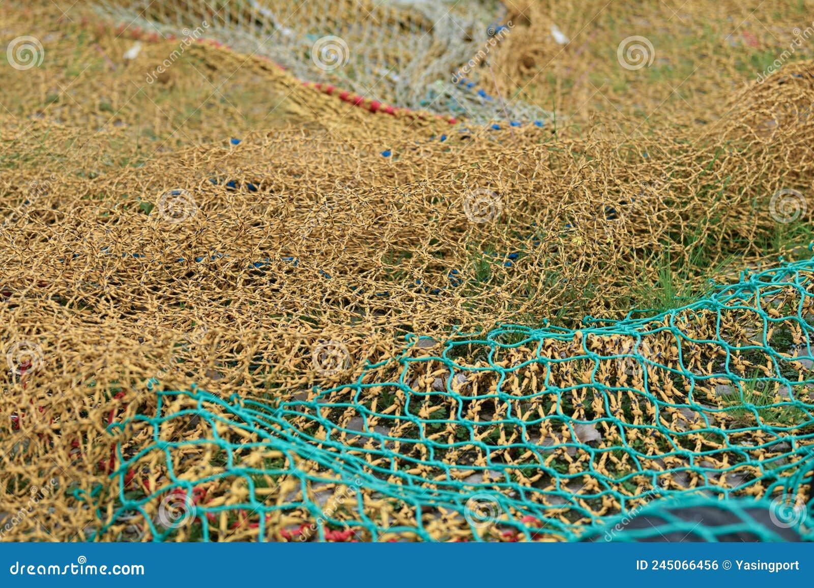 Colorful Fishing Nets and Floats for Fish Stock Photo - Image of ...