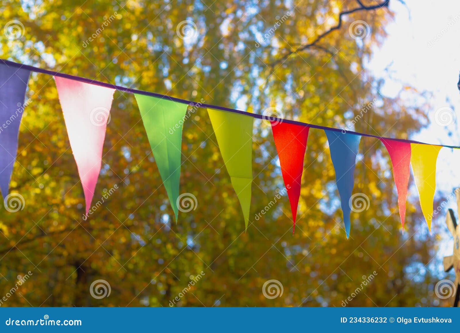 Colorful Flags Hang between the Autumn Trees in Autumn Stock Photo ...