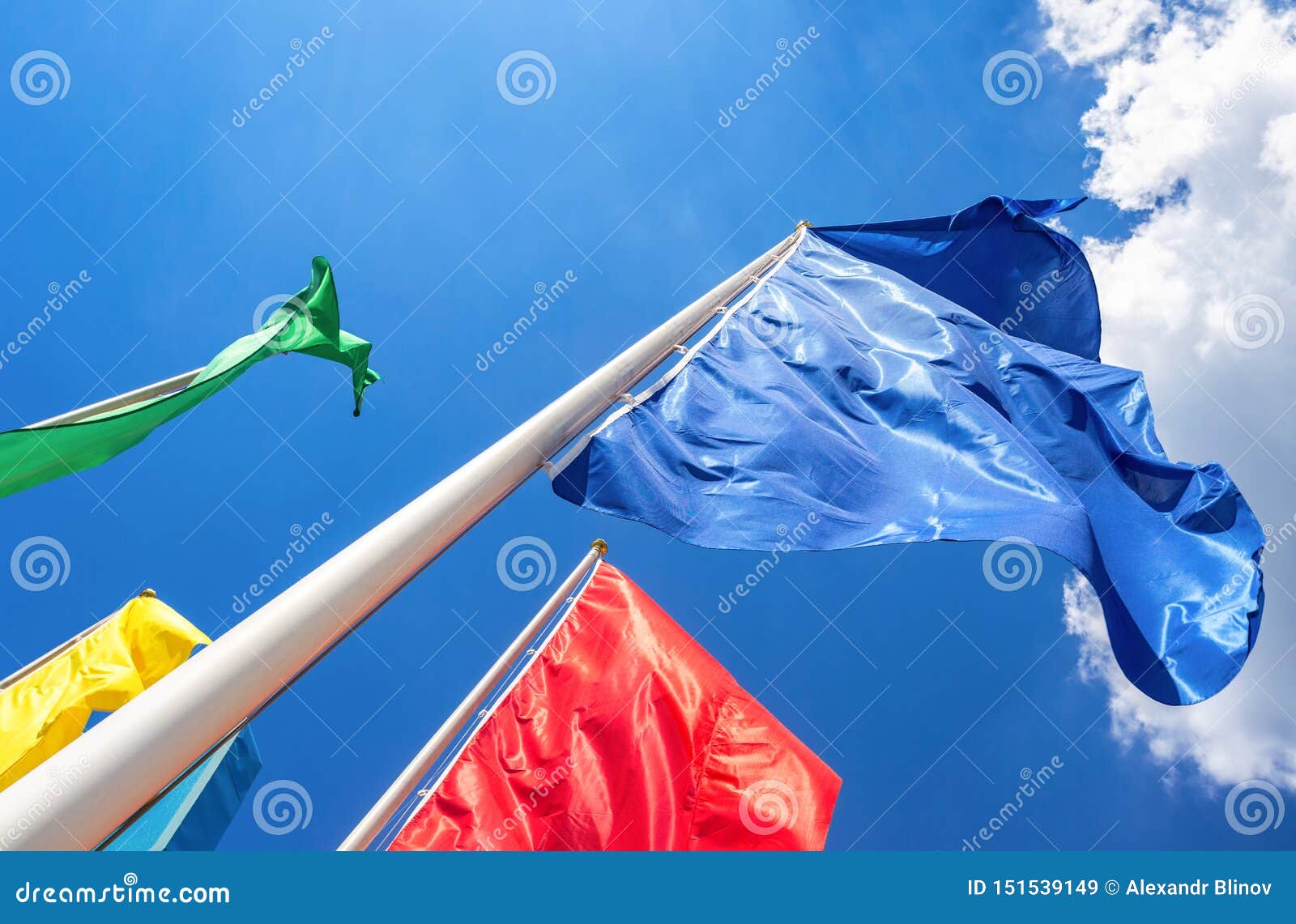 Colorful Flags in the Wind Against the Blue Sky Stock Image - Image of ...