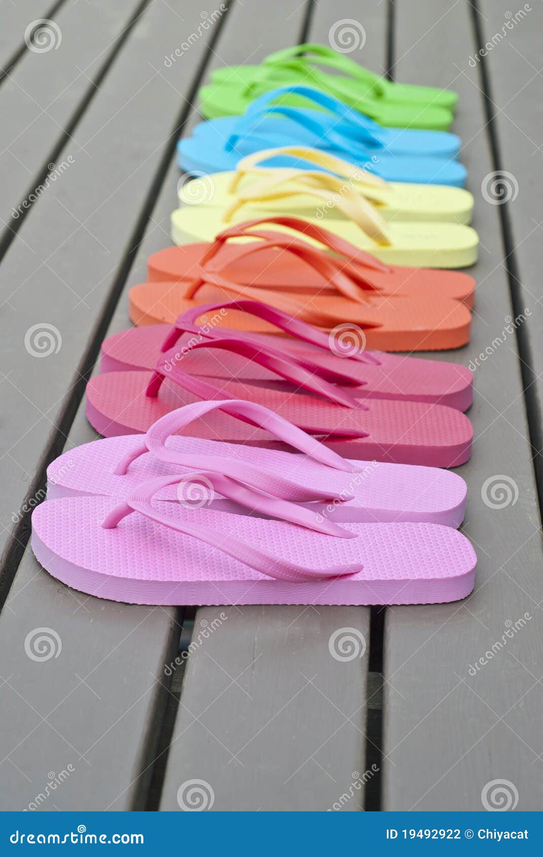 Colorful Flip Flops on the Deck Stock Photo - Image of colorful, green ...