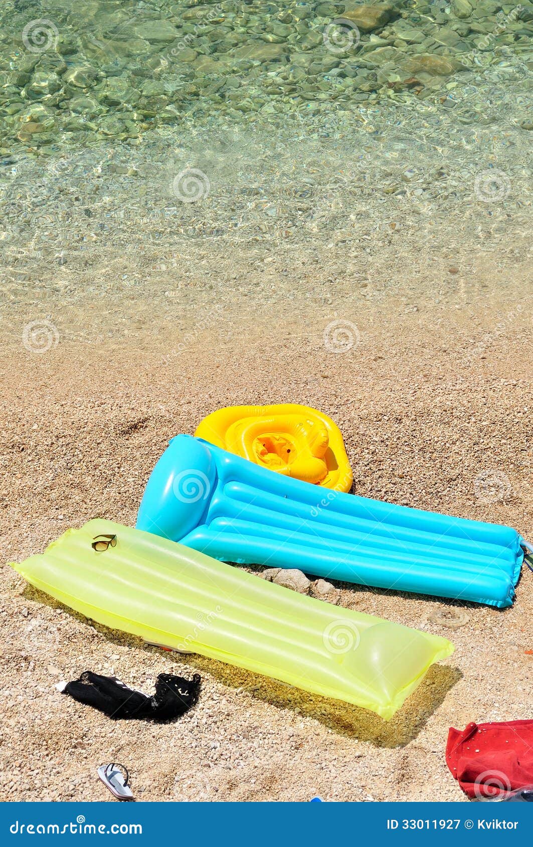 Colorful Floating Beds with Beach Items in Beach Stock Image - Image of ...