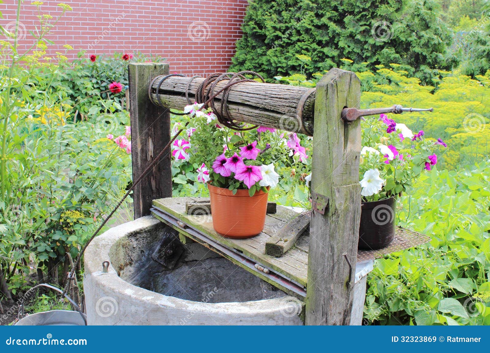 Colorful Flowers on the Old Well Stock Image - Image of garden ...