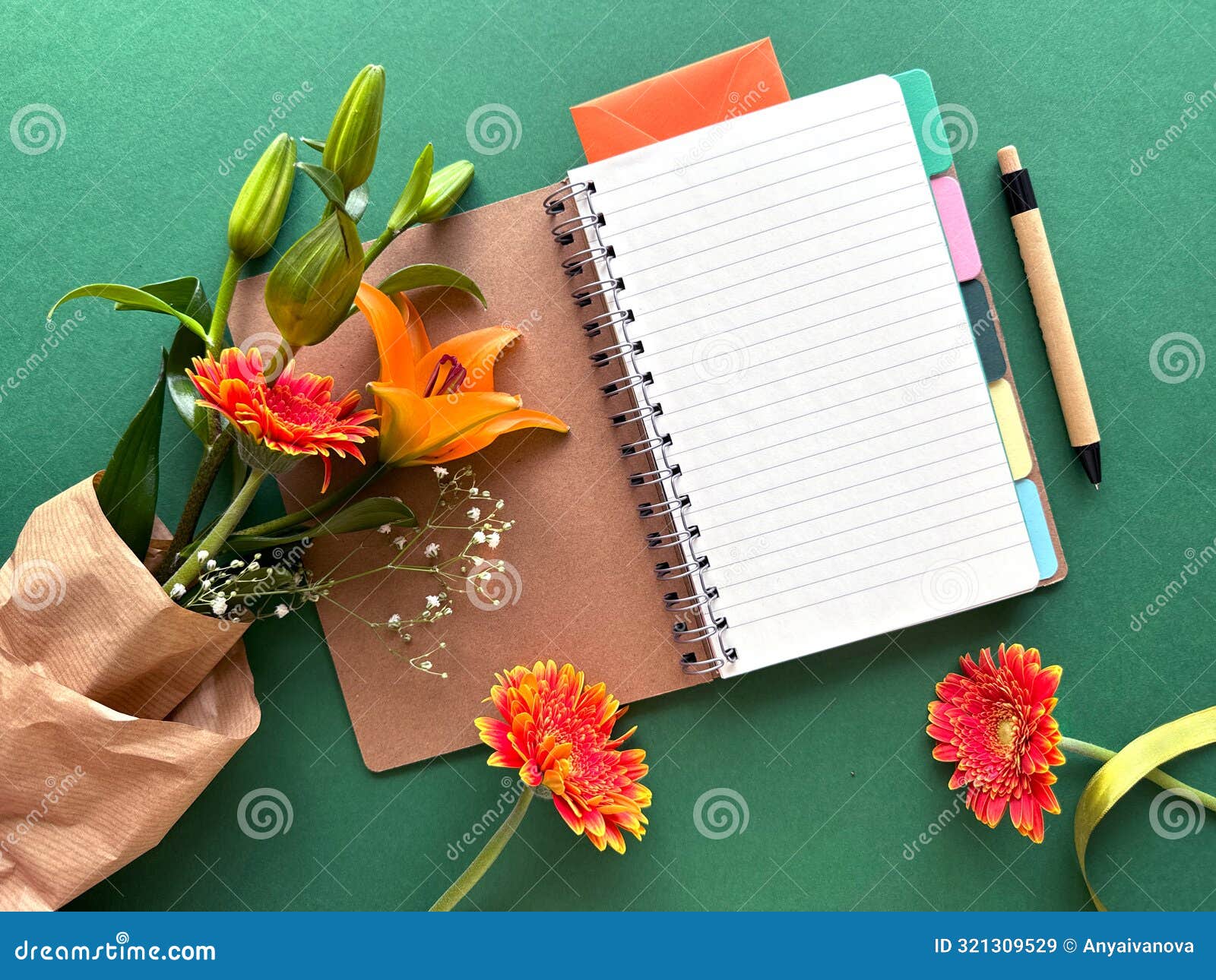 Colorful Flowers and Open Notebook on Green Background with Pen and ...
