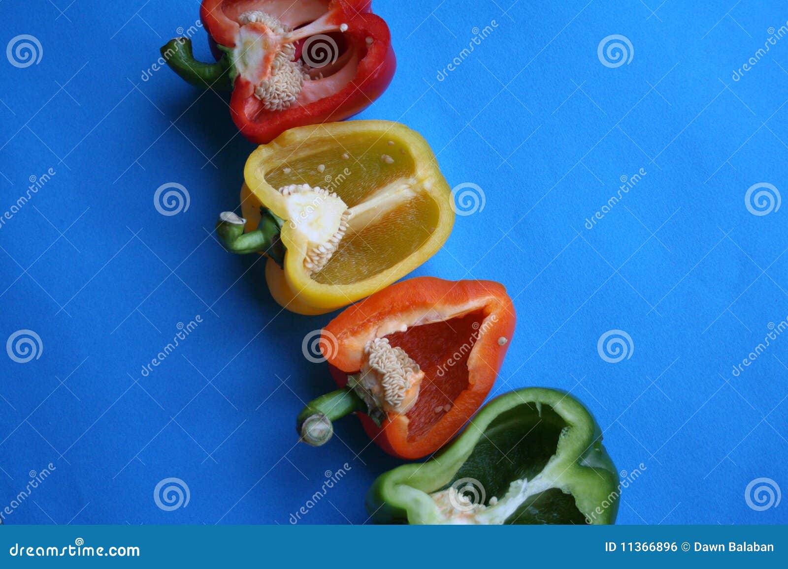 Colorful Four Peppers Sliced in Half Stock Photo - Image of diet, bowl ...