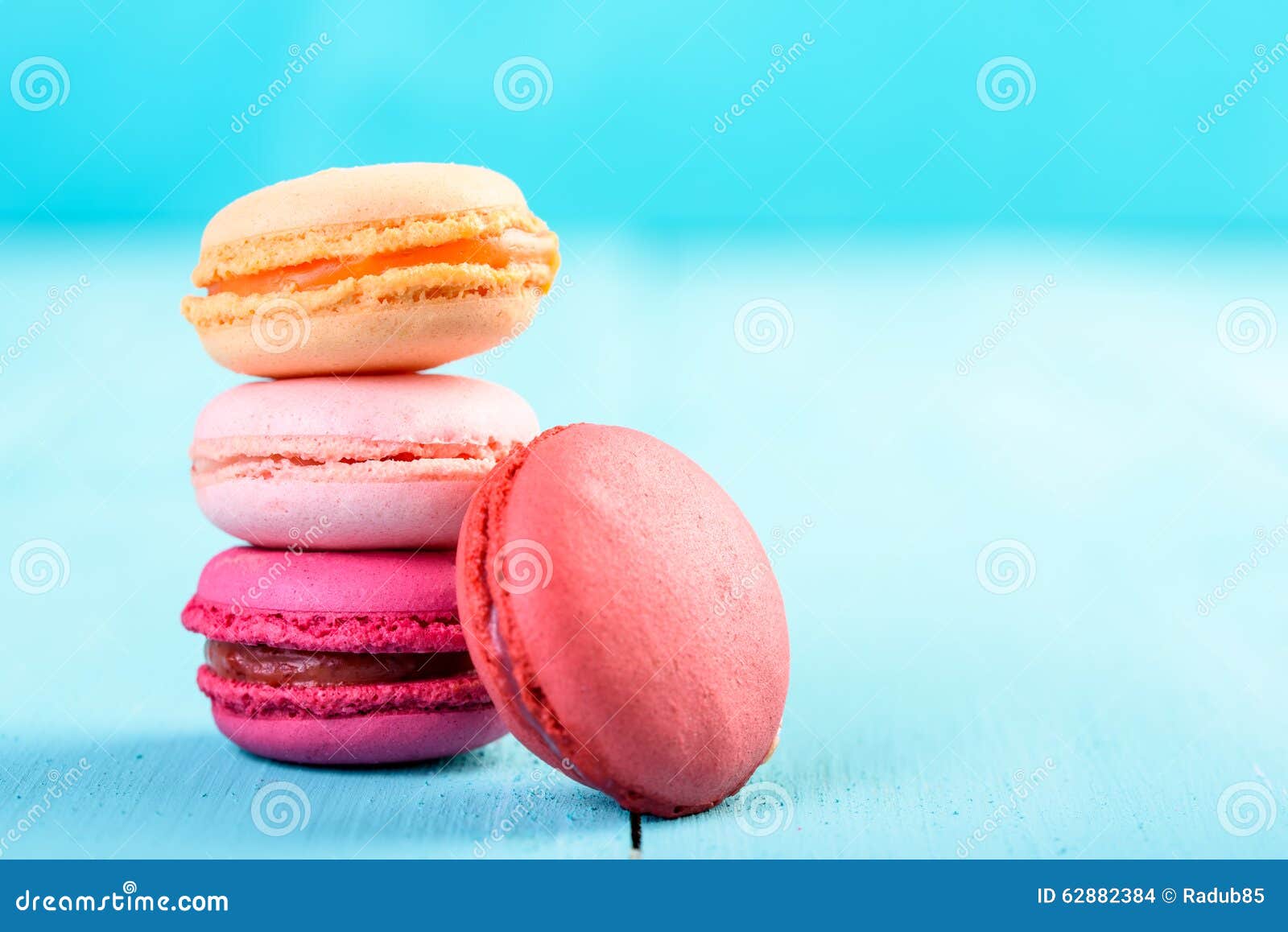 Colorful French Macaroons on Blue Stock Photo - Image of french, coffee ...