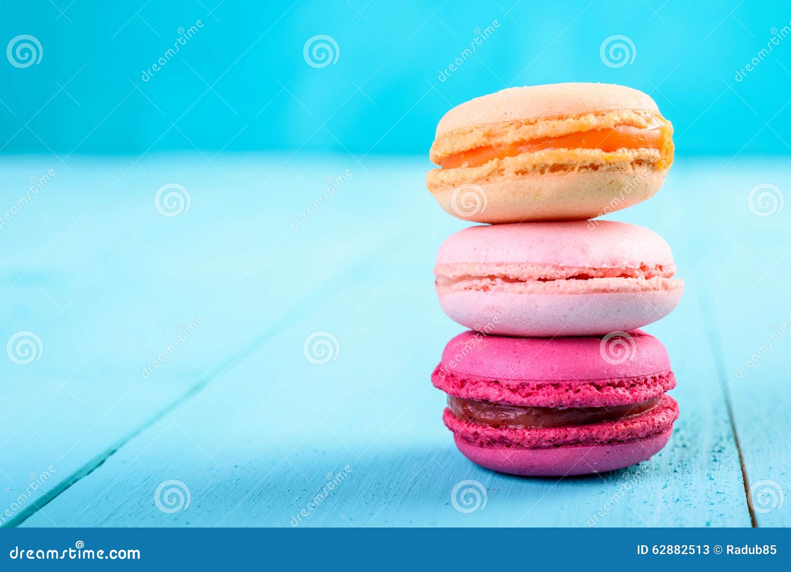 Colorful French Macaroons on Blue Stock Image - Image of dessert, food ...