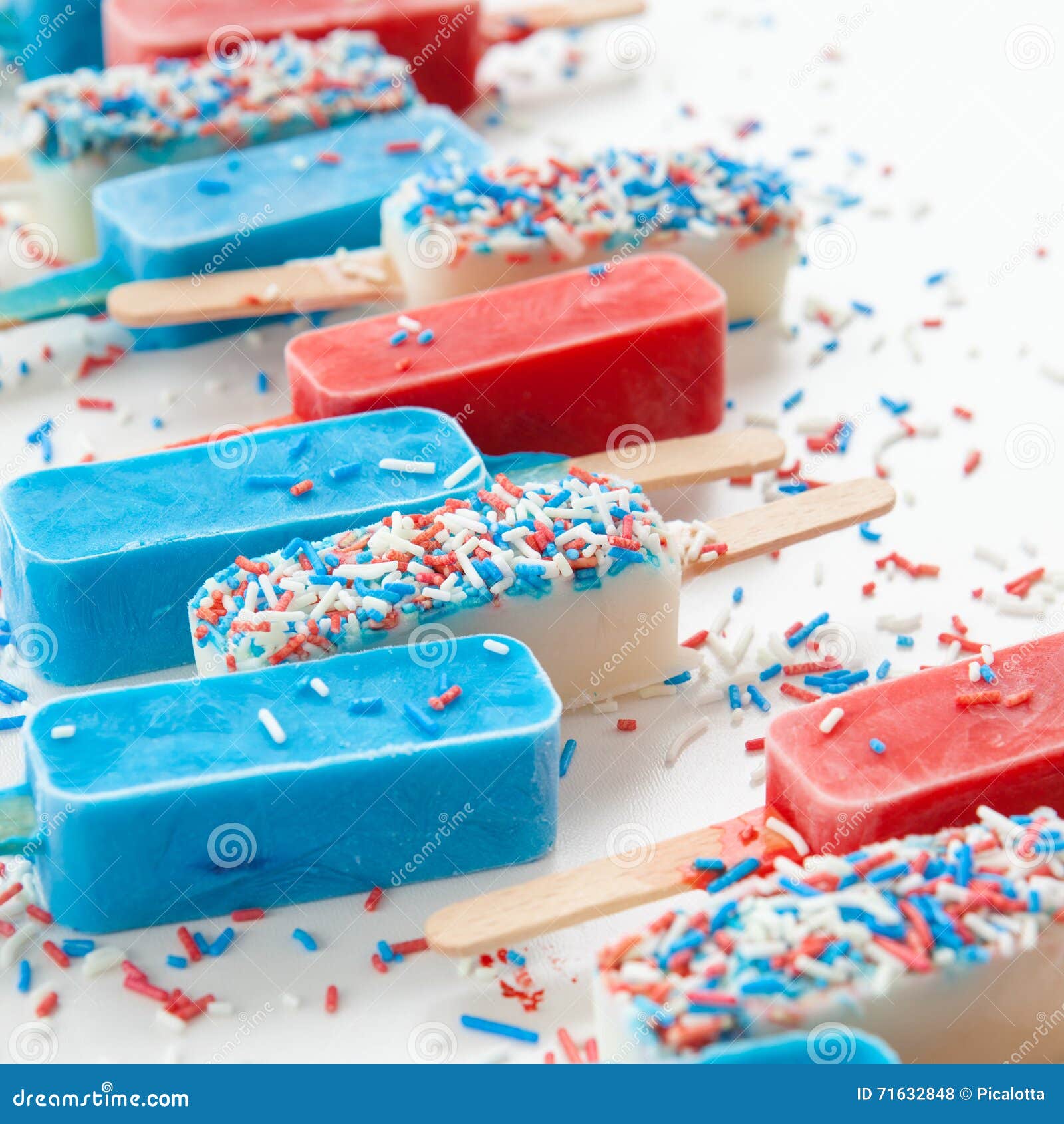 Colorful frozen popsicles stock photo. Image of sprinkles - 71632848