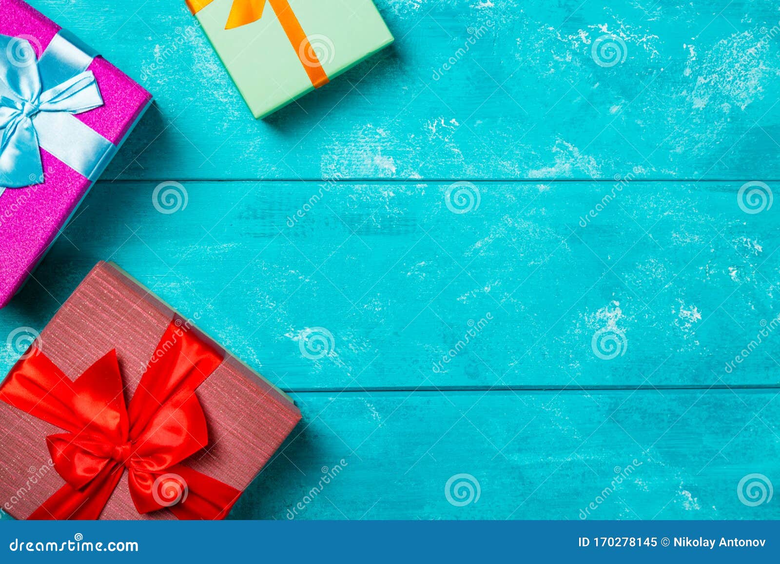 Colorful Gift Boxes on Nice Blue Wooden Background with Free Space ...