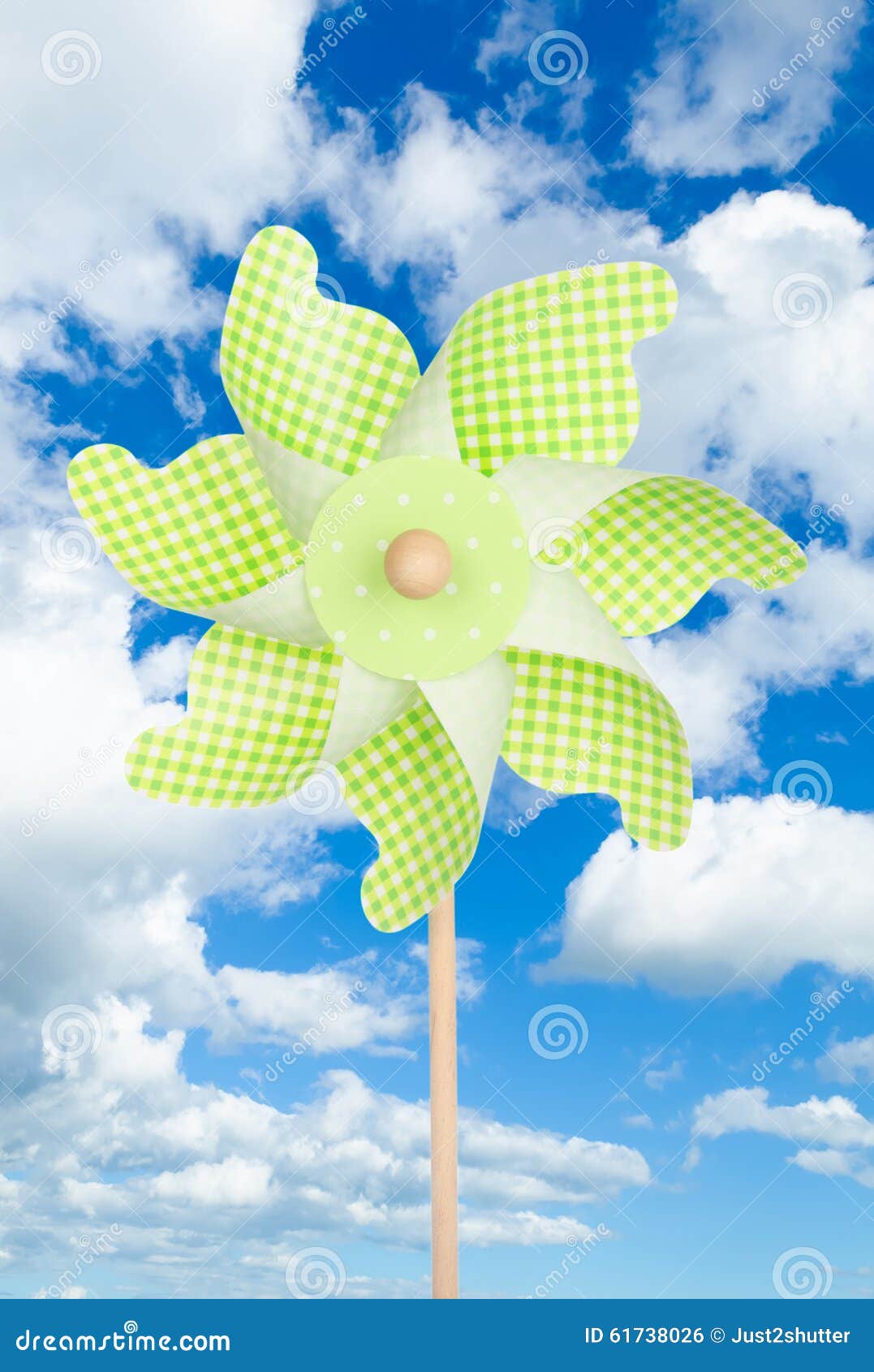 Colorful Green Pinwheel Over Blue Sky Stock Photo - Image of climate ...