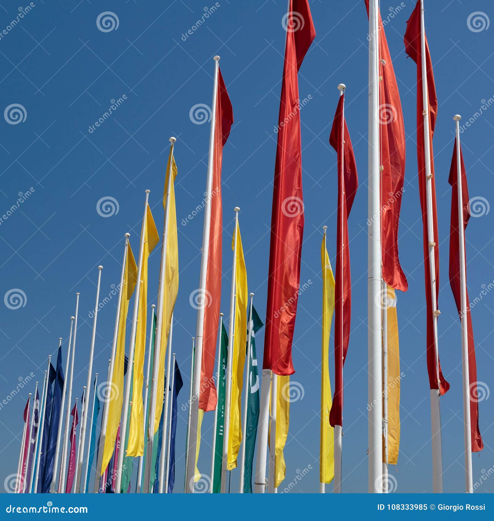 Colorful Groups of Flags Against Blue Sky Stock Image - Image of tall ...