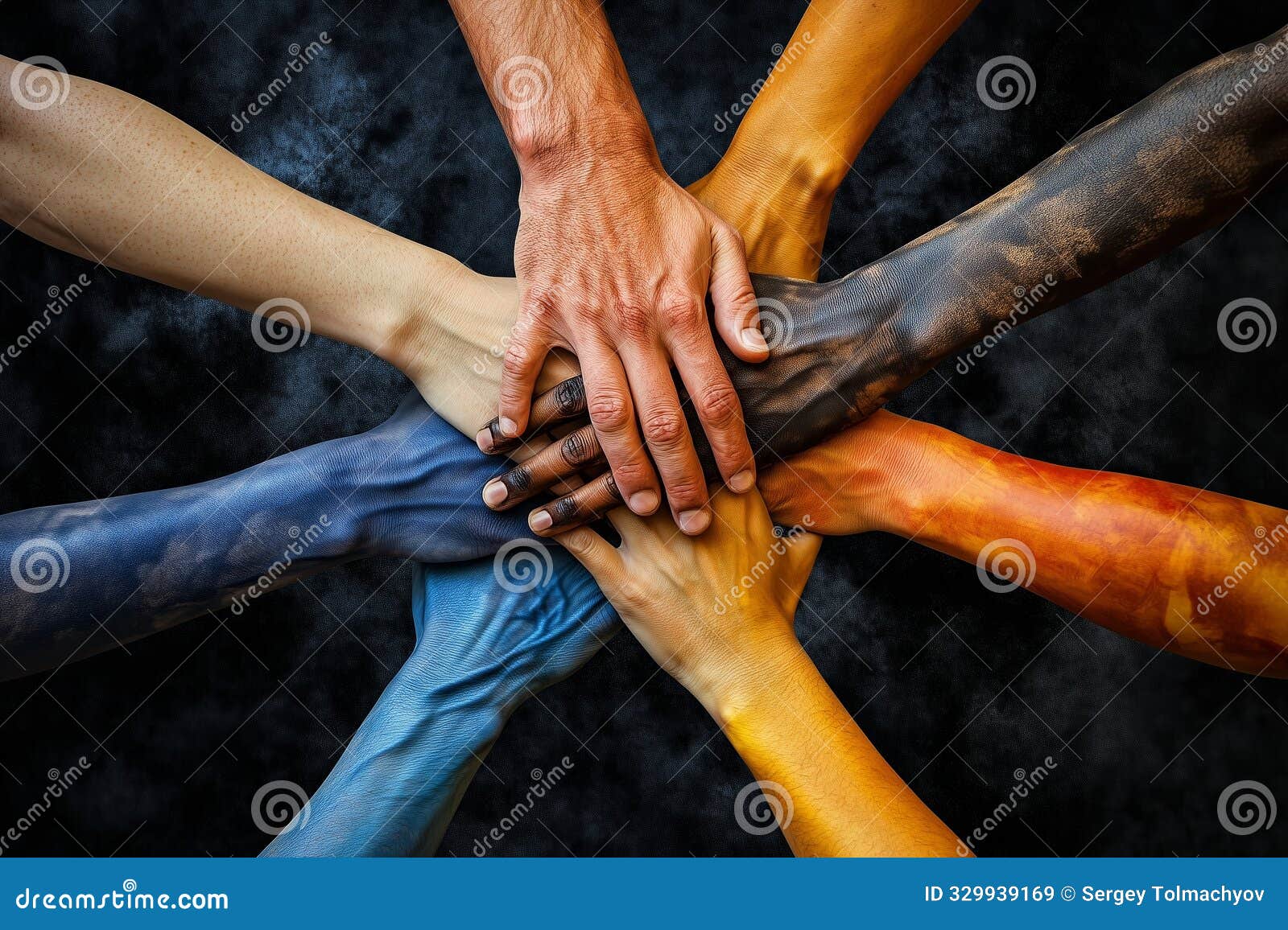 Colorful Hands Together in Unity Against a Dark Background during ...