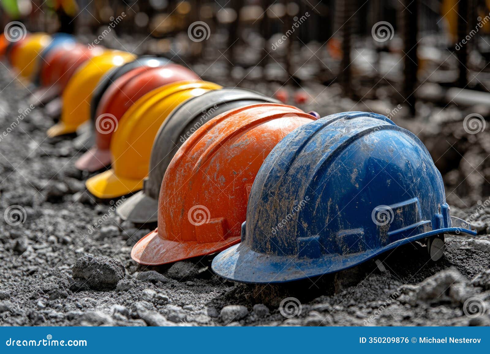 Colorful Hard Hats Resting on Ground at Construction Site Symbolizing ...