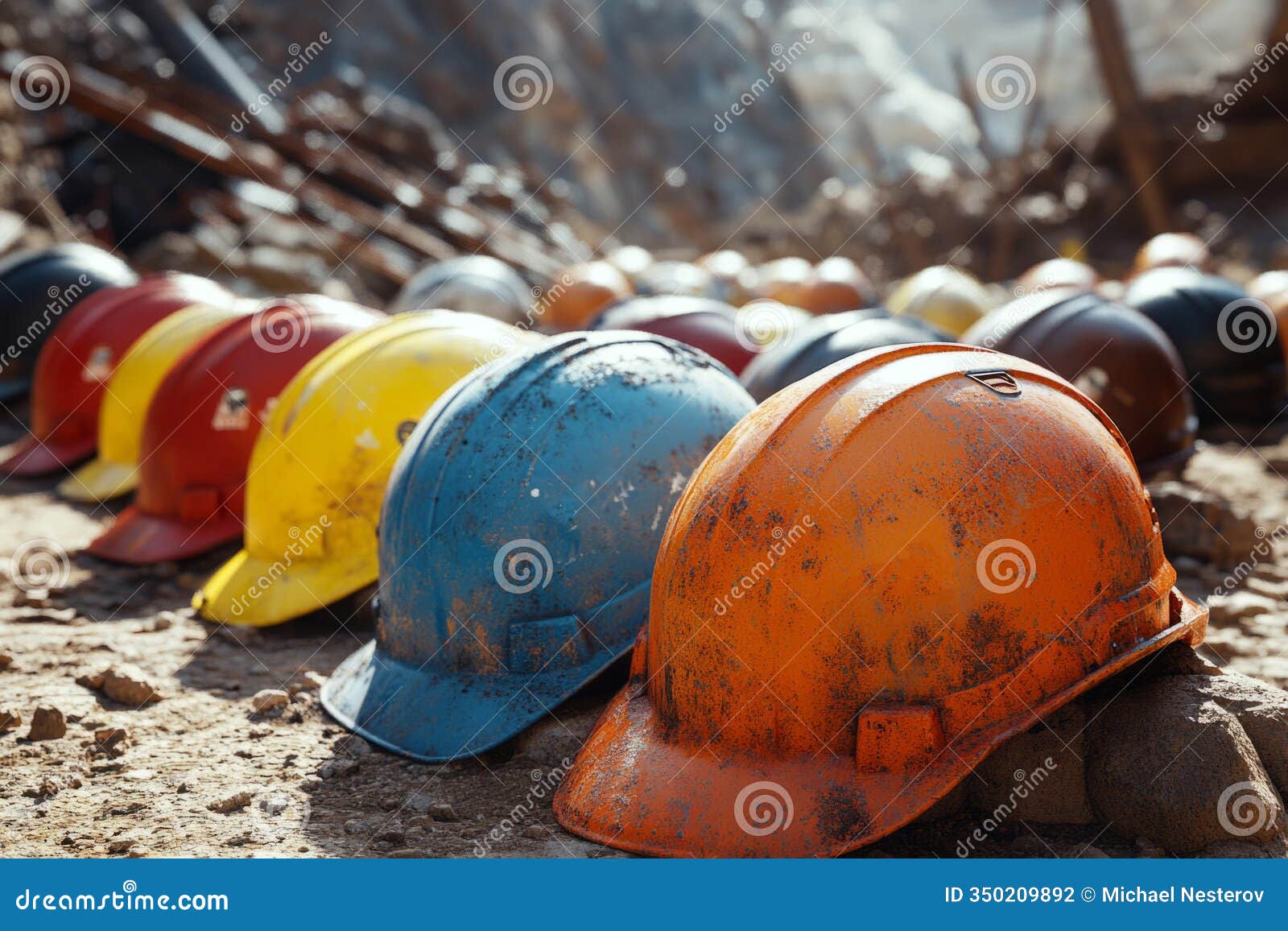 Colorful Hard Hats Resting on Ground at Construction Site Symbolizing ...