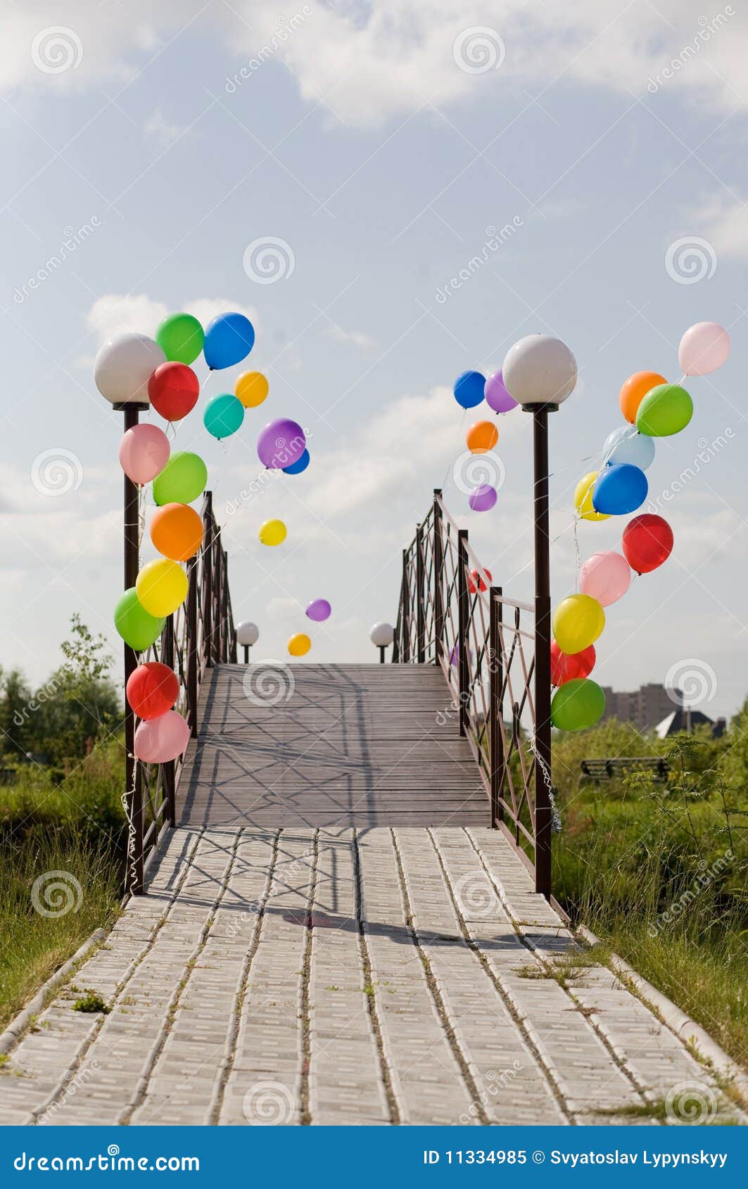 Colorful Helium Baloons at Bridge Opposite Blue Sky Stock Image - Image ...