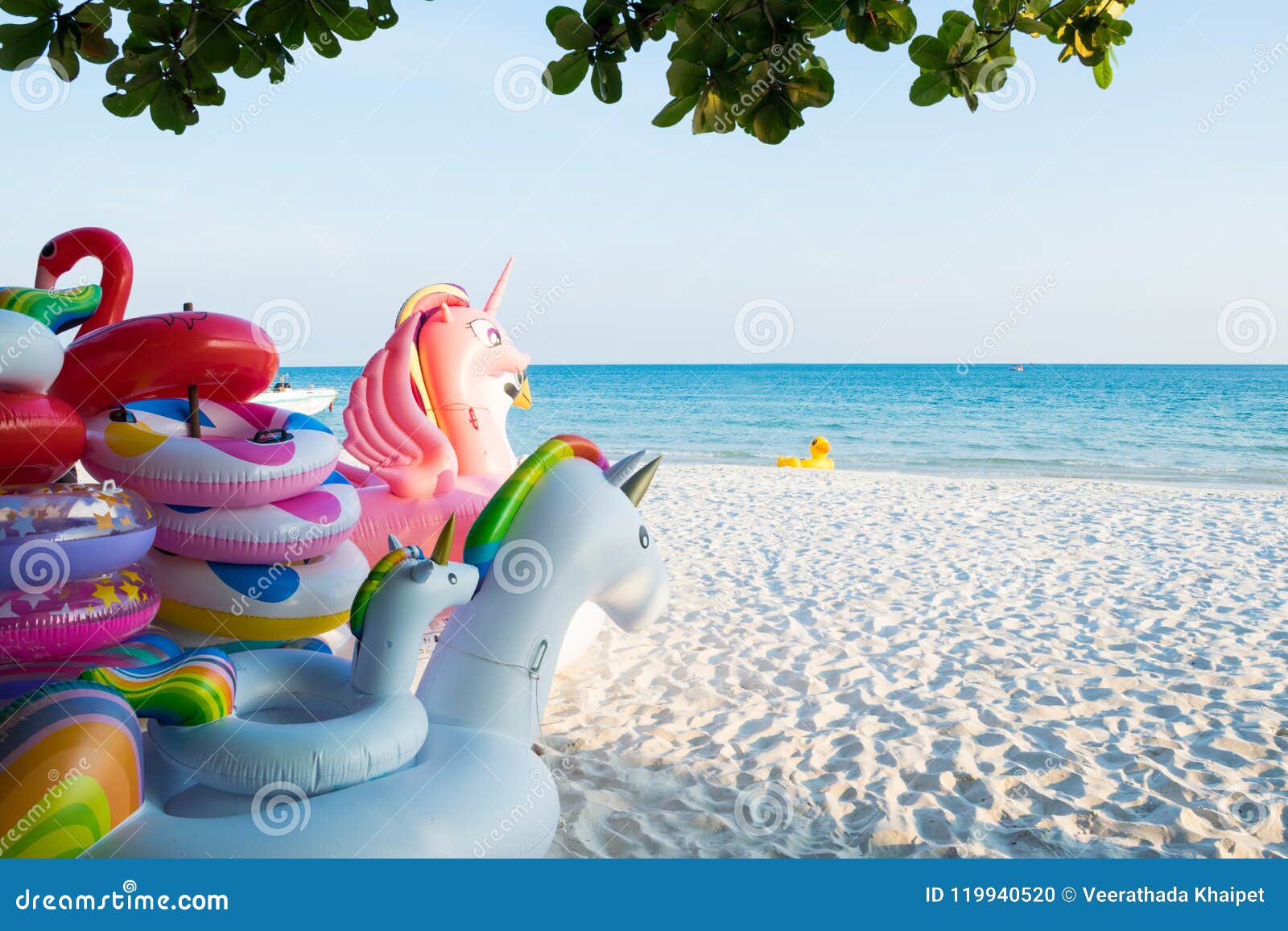 Colorful Inflatable Floating on the Beach Stock Photo - Image of ...